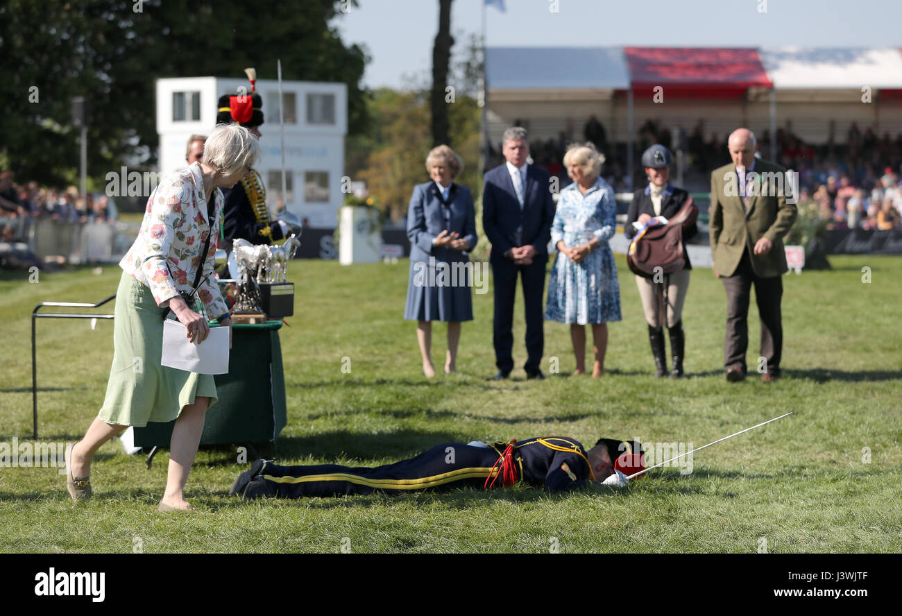 A soldier faints during the trophy presentation on day five of the 2017 ...
