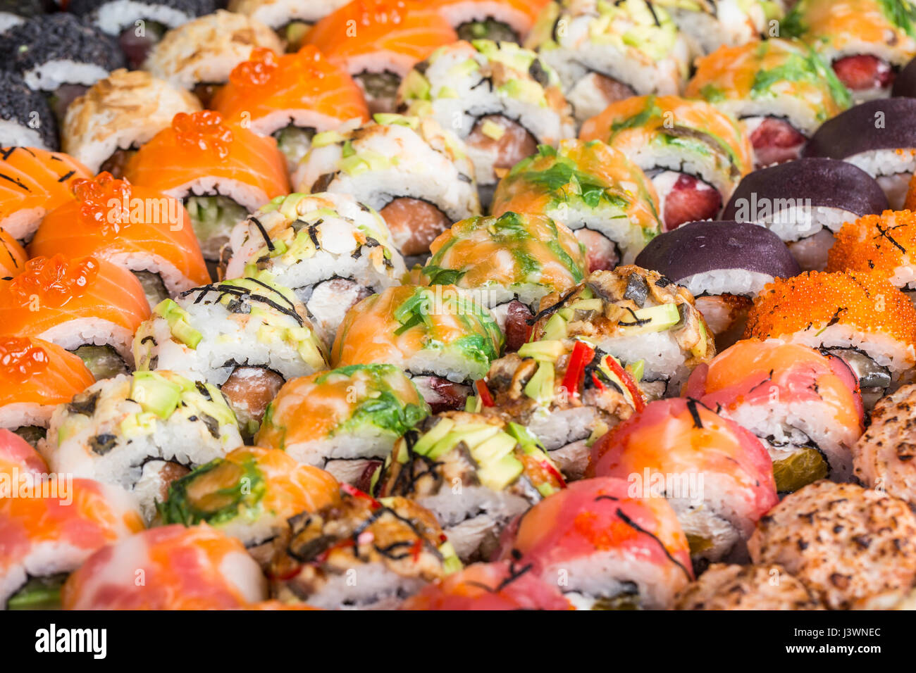 Close up of different types of sushi rolls Stock Photo - Alamy