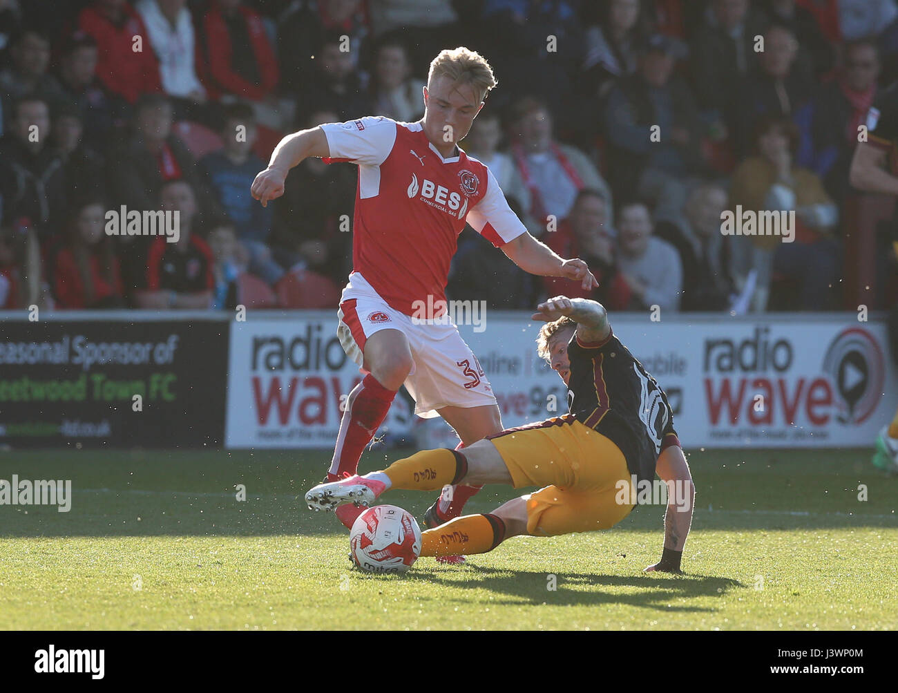 Fleetwood Town's Kyle Dempsey (left) and Braford's Billy Clarke battle ...