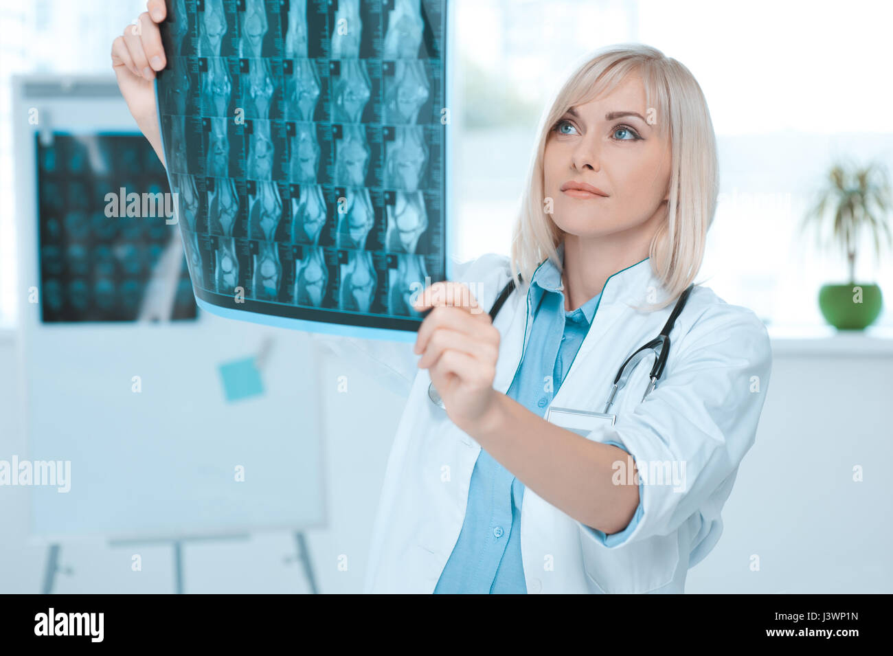 Young woman doctor occupation in the hospital office Stock Photo - Alamy