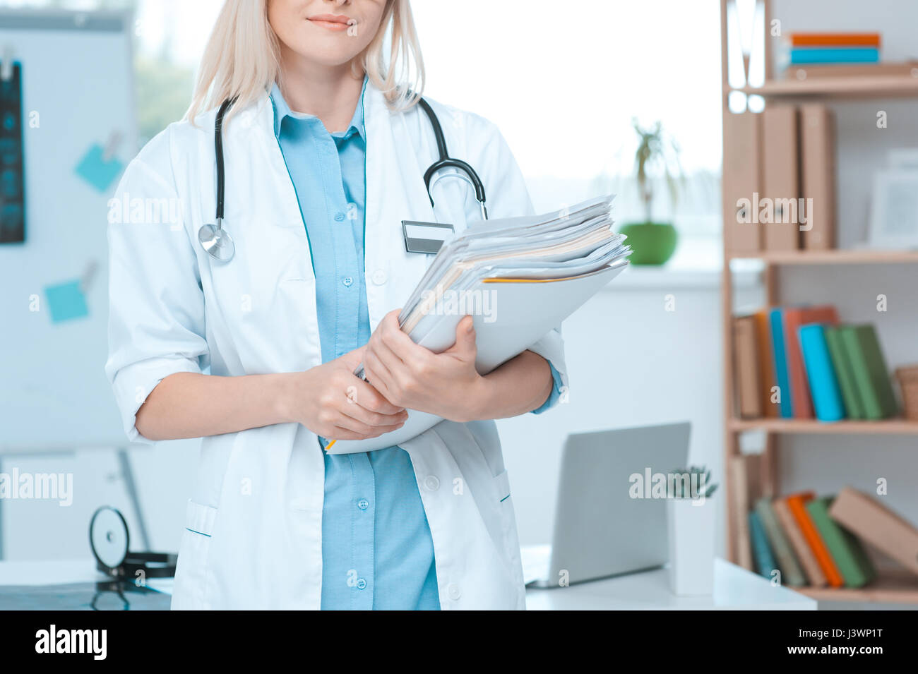 Young woman doctor occupation in the hospital office Stock Photo - Alamy