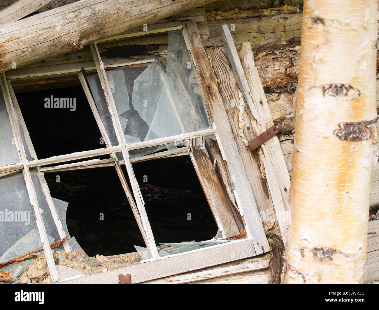 Broken window in abandoned old house Stock Photo - Alamy