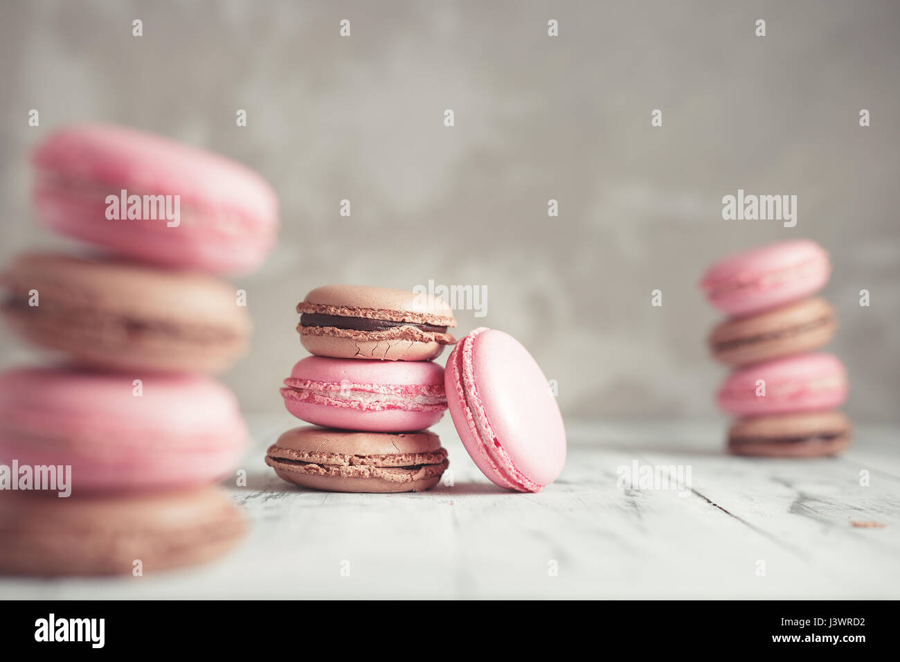 Stack of Raspberry and Chocolate pastel colored Macarons or Macaroons ...