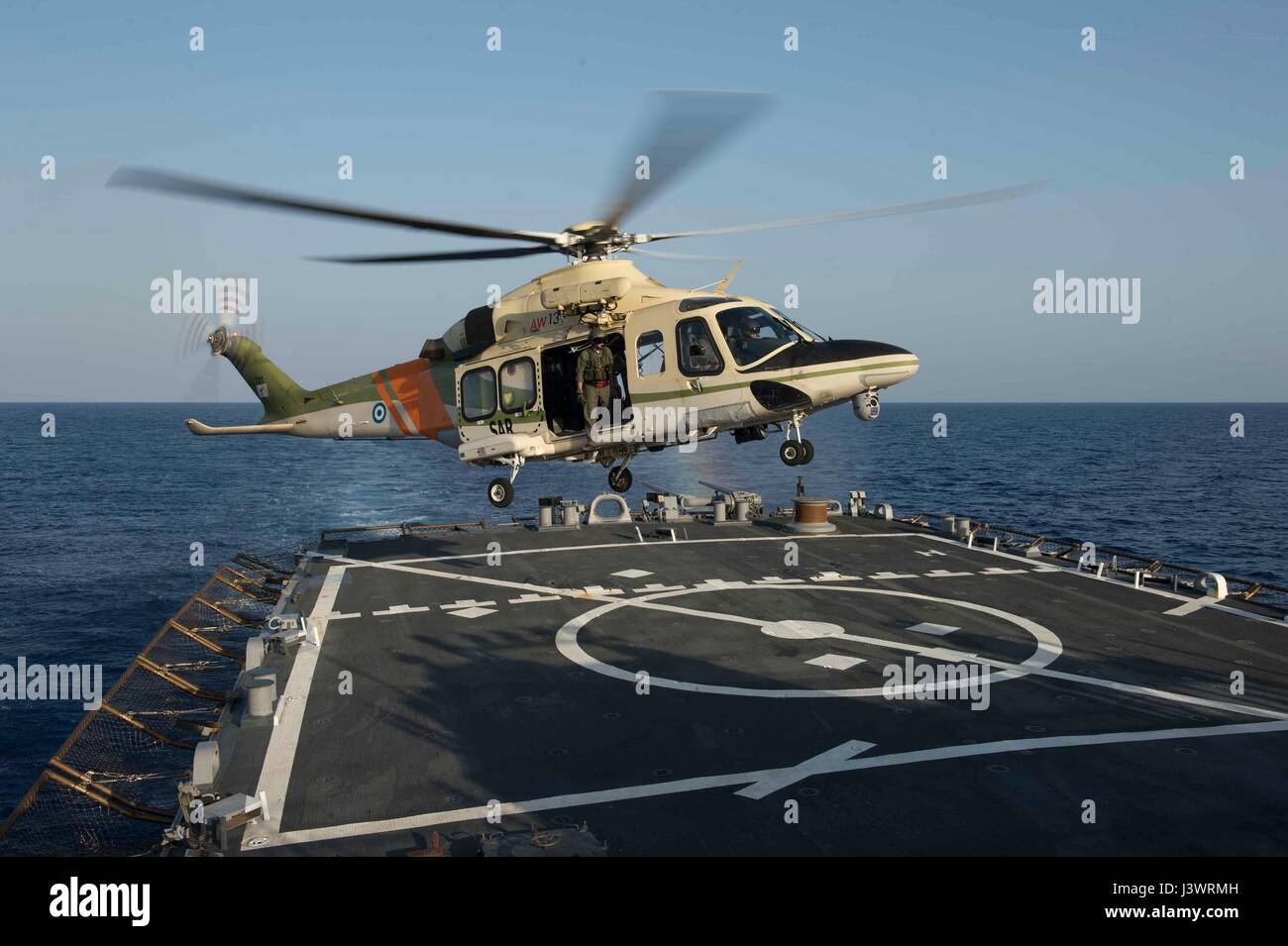 A Cypriot AW139 search and rescue helicopter launches from the flight ...