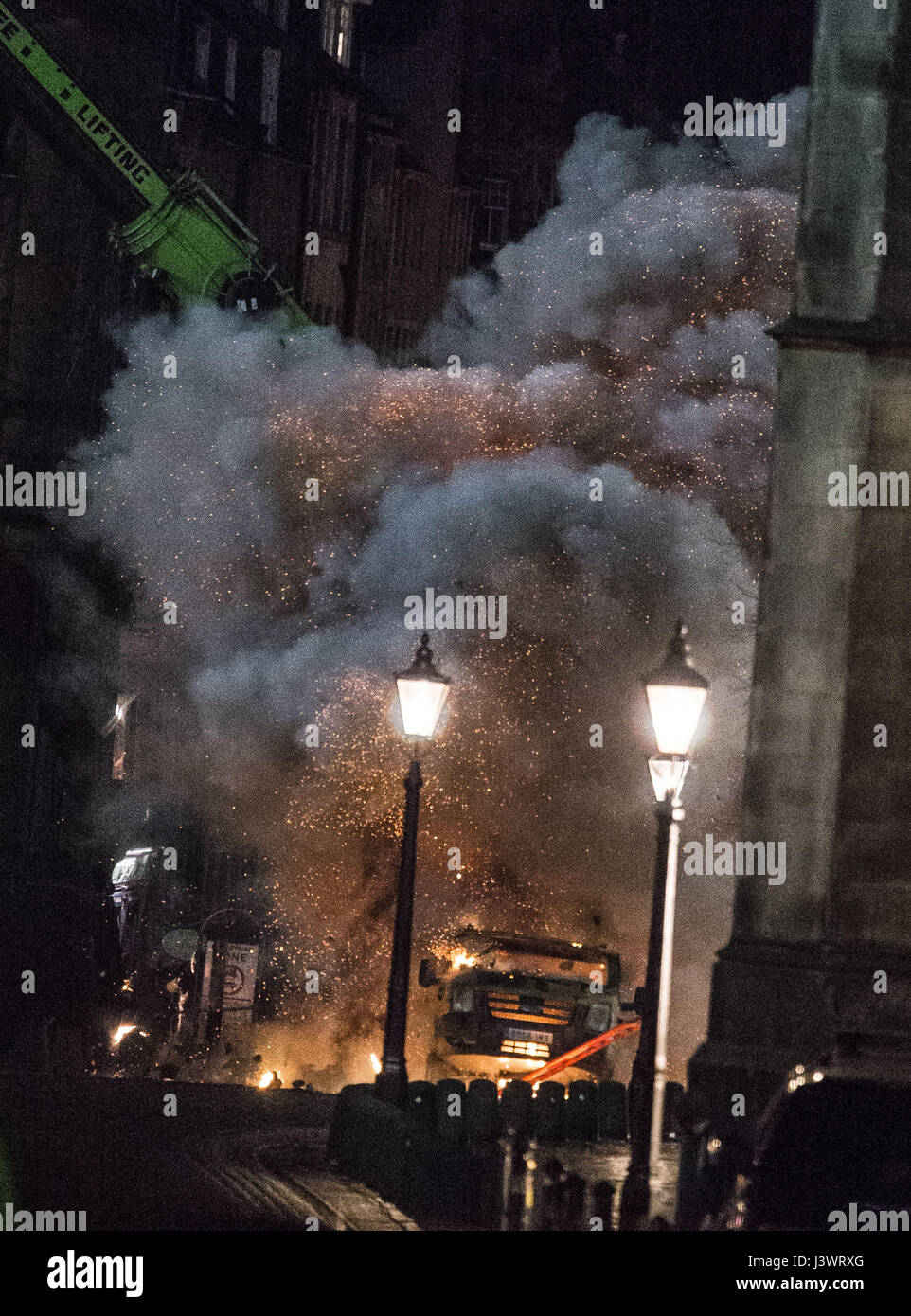 A van is exploded on the Royal Mile in Edinburgh for the upcoming movie ...