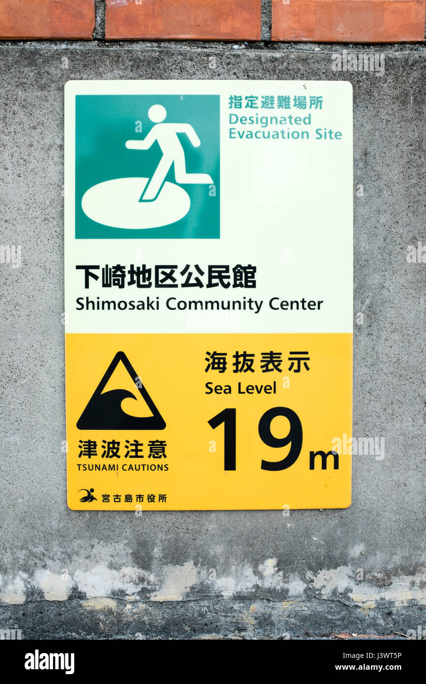 Warning sign informing of Sea level in case of tsunami / earthquake ...