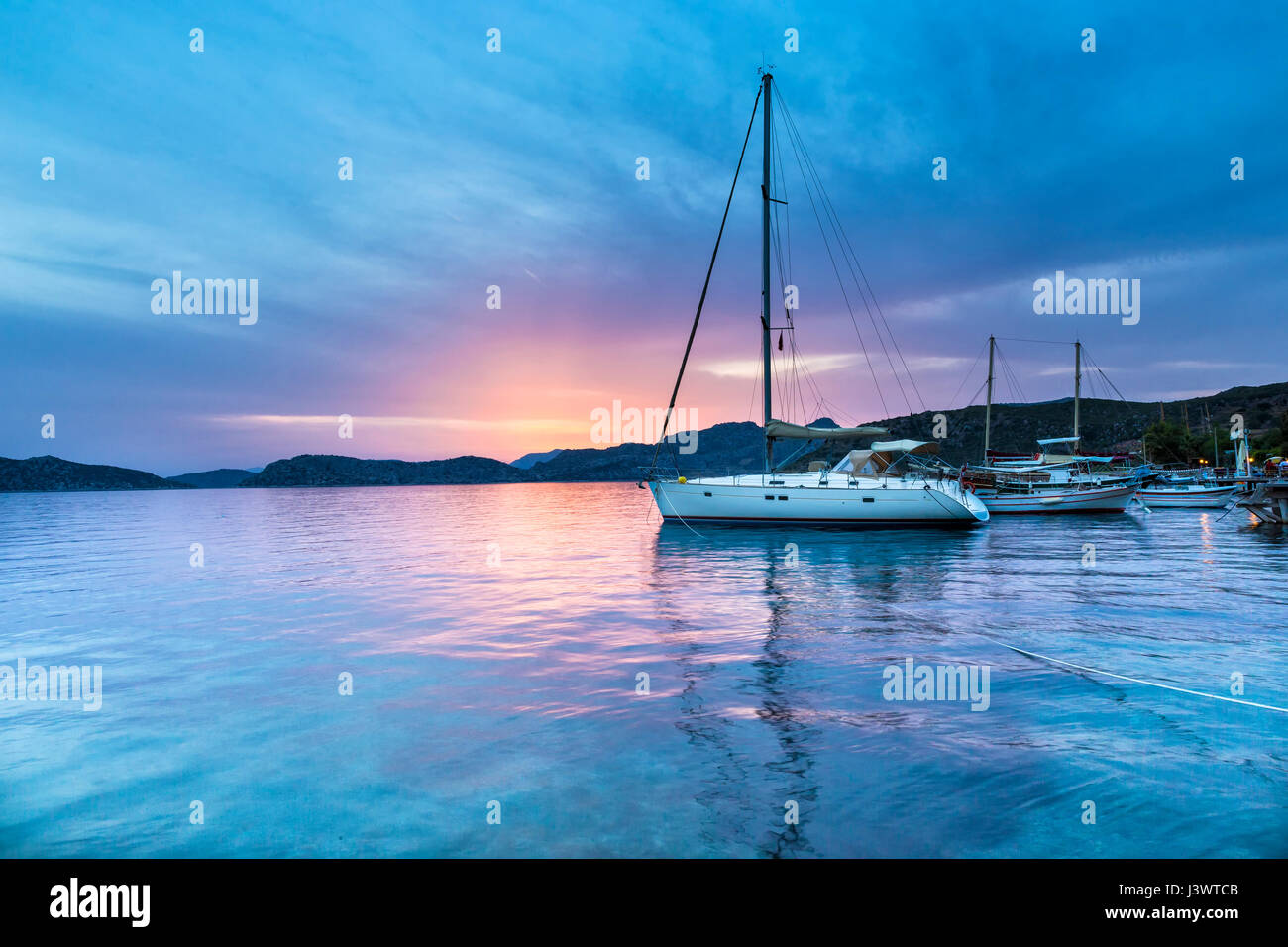 Beautiful sunset colors on the sea at Sogut. Sogut is a village in ...