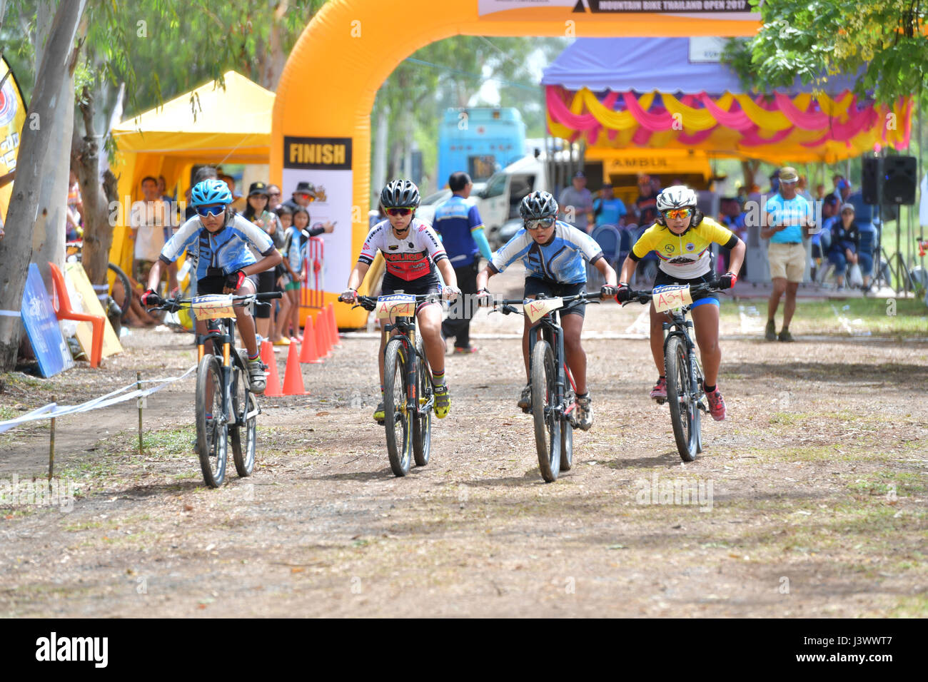 Singburi, Thailand. 7th May 2017. Biker riding a mountain bike at ...