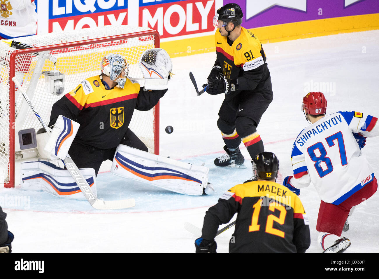 Russia's Vadim Shipatchyov (R) scores 0-1 against Germany's goalkeepr ...