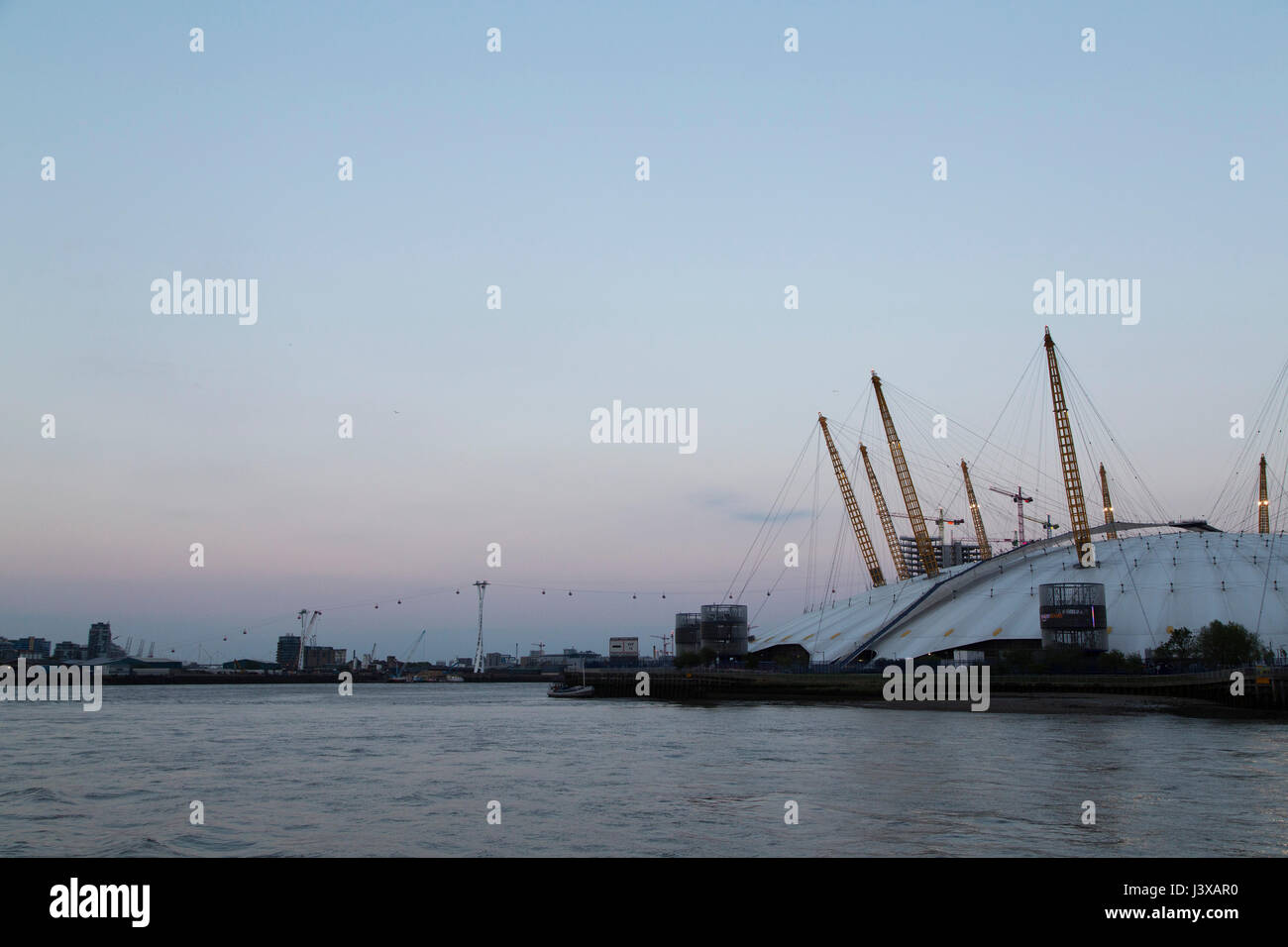 The Emirates Greenwich Peninsula crosses the River Thames near the O2 ...