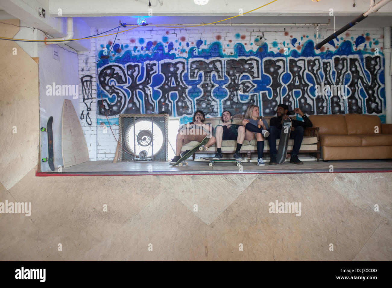 Four young men Stock Photo - Alamy