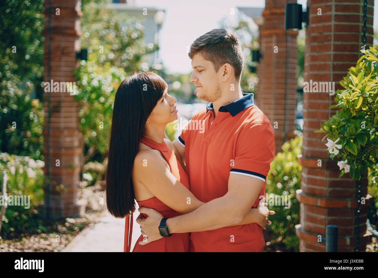 love couple red dress Stock Photo - Alamy