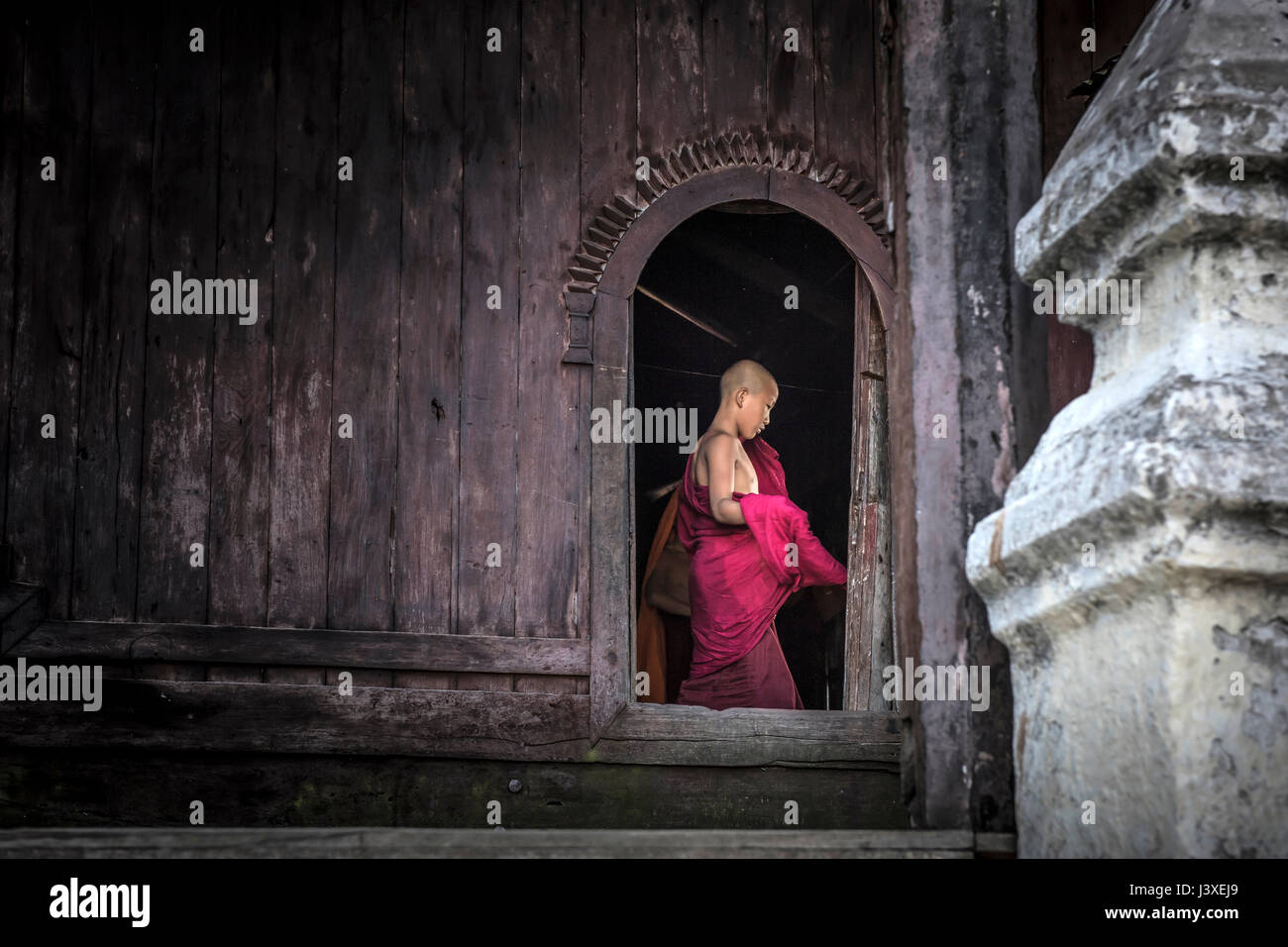 Myanmar One monk is preparing before meditation Stock Photo - Alamy