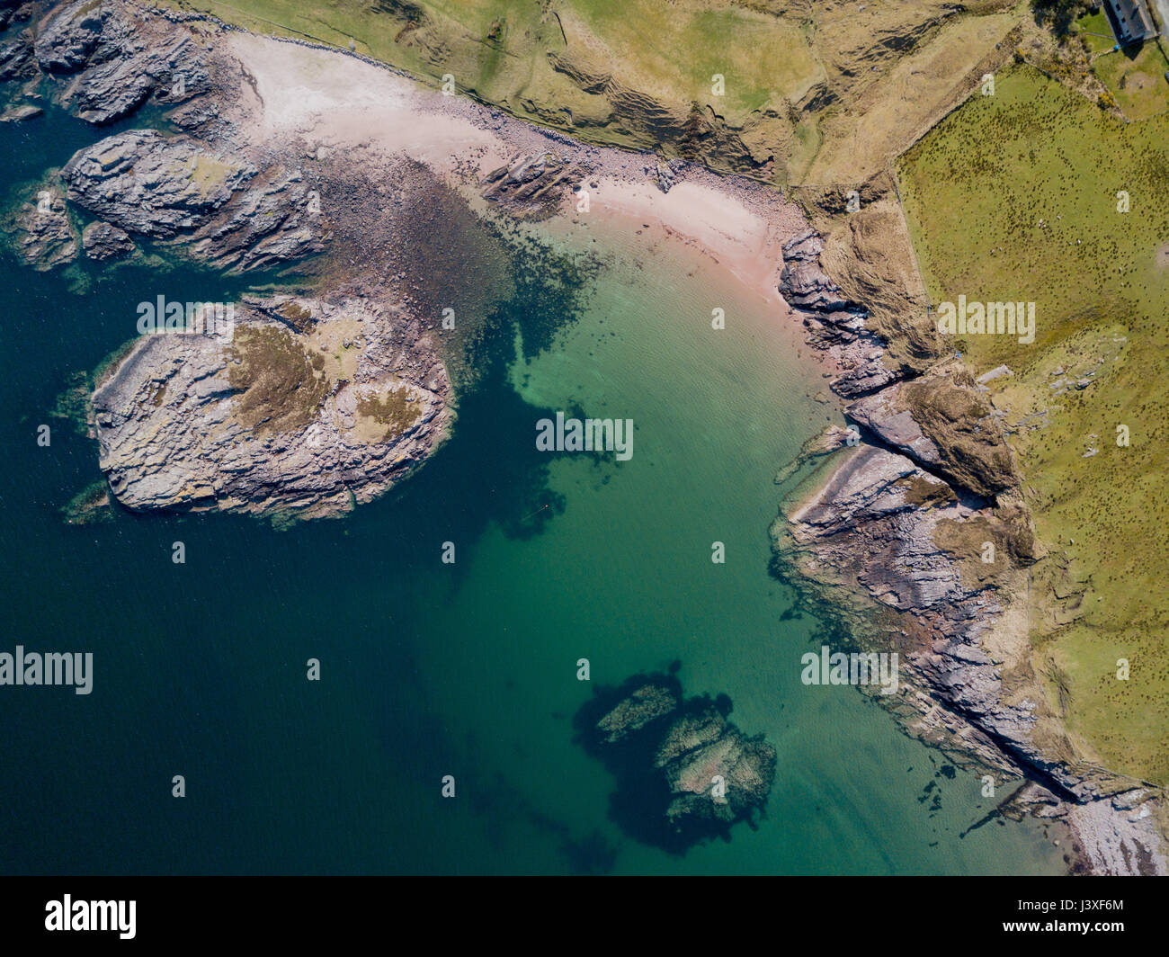 Aerial view (birds eye view) of the coast in the Scottish Highlands ...