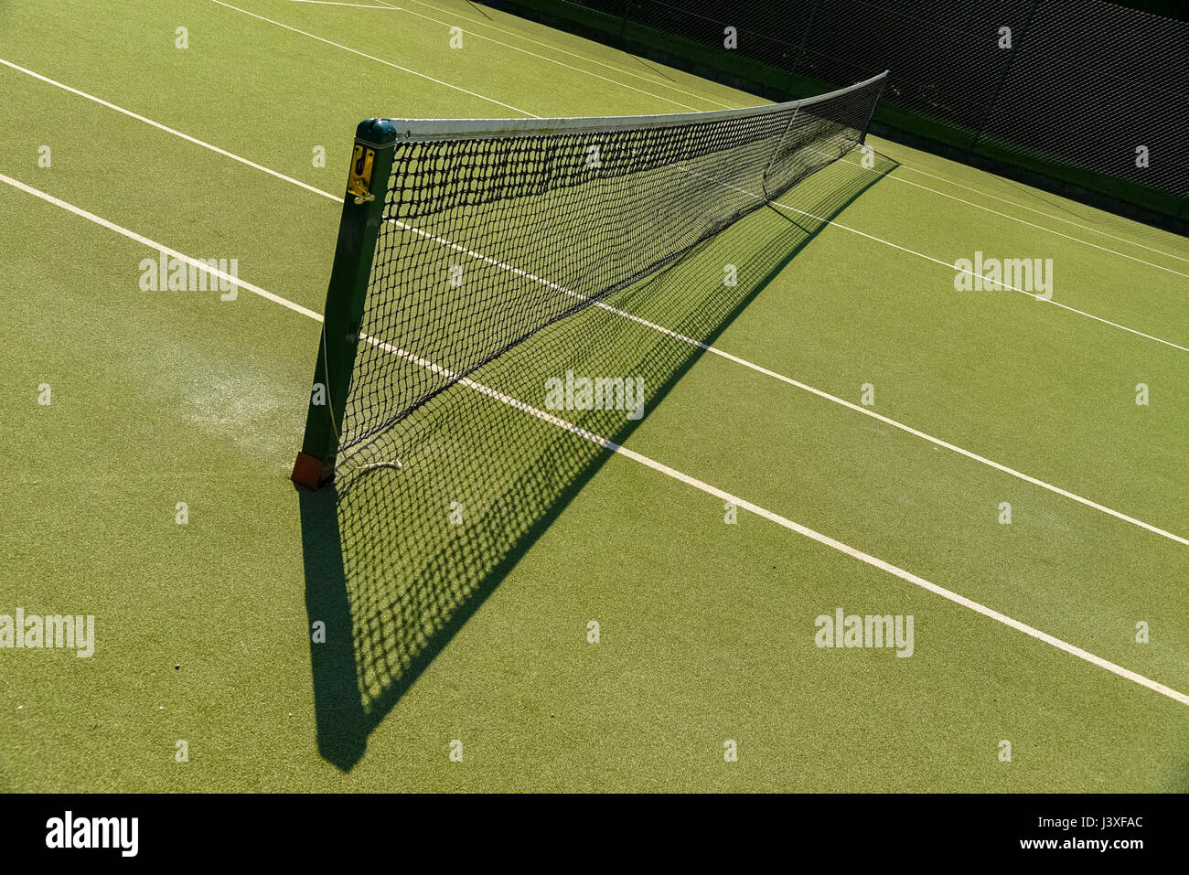tennis net with shadow Stock Photo - Alamy