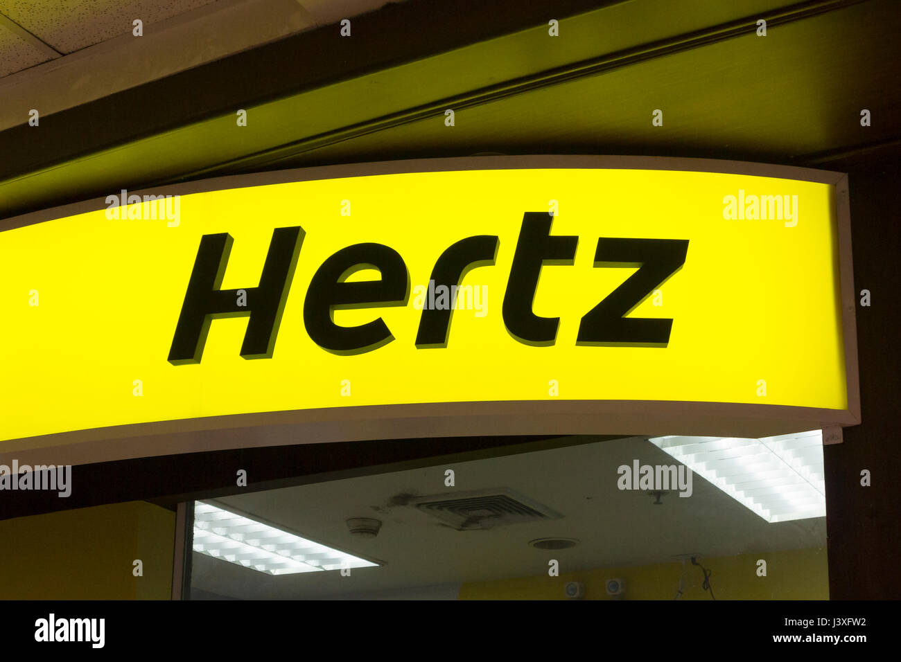 Hertz sign, Thailand Stock Photo - Alamy