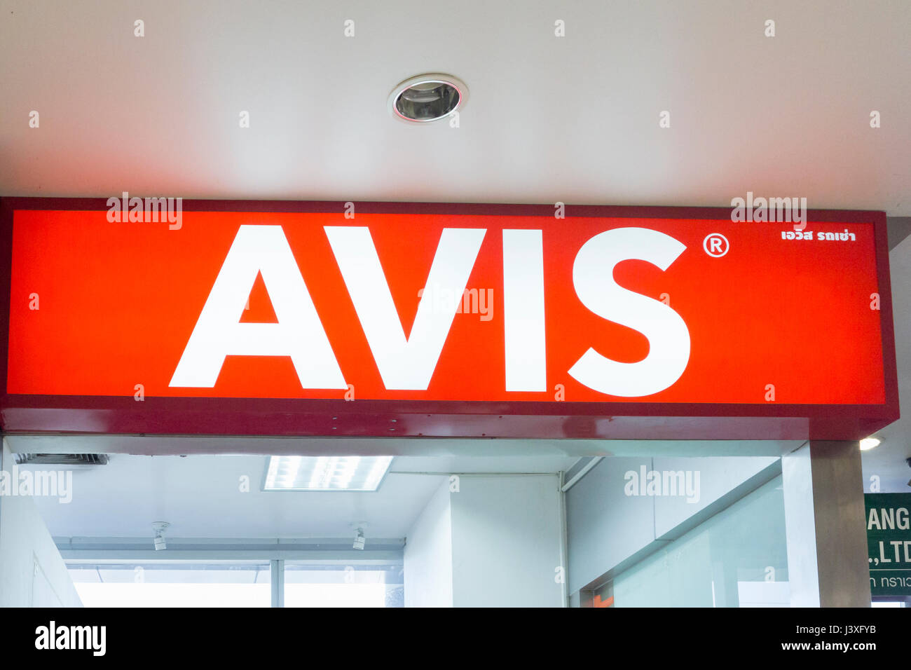 Avis shop sign, Thailand Stock Photo - Alamy