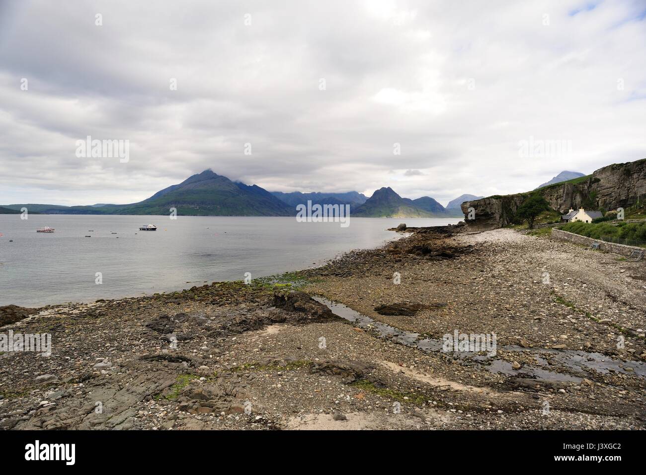 A house with a view looking at the Cullin mountains from Elgol Stock ...