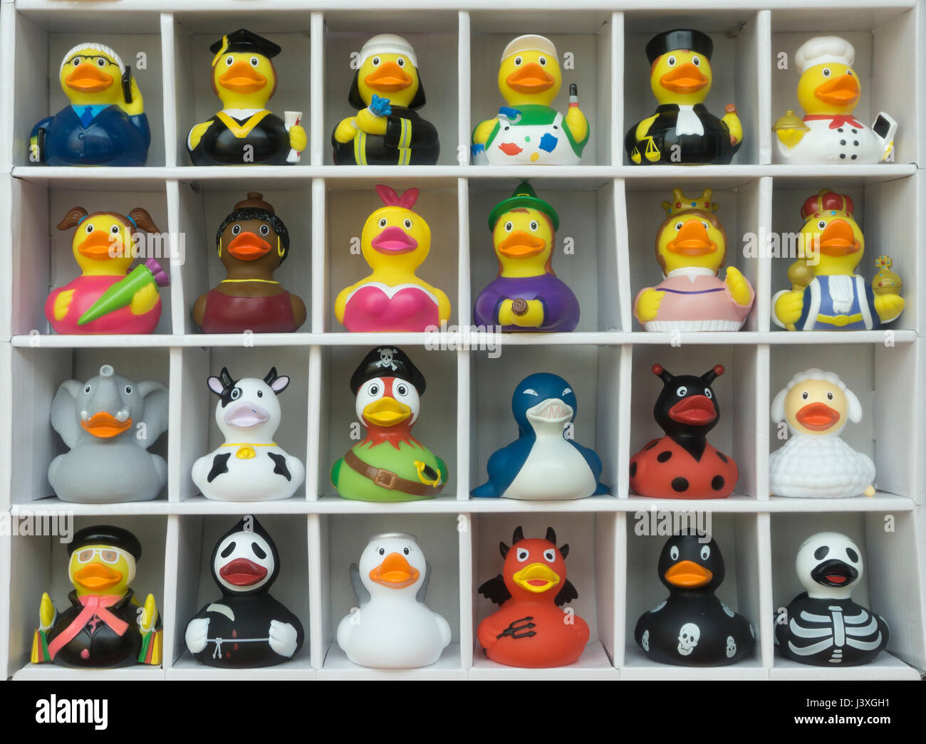 toy plastic ducks dressed for different careers Stock Photo - Alamy