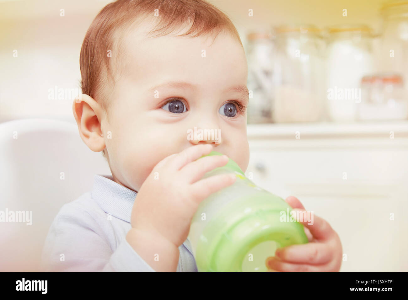 Baby boy drinking from bottle hi-res stock photography and images - Alamy