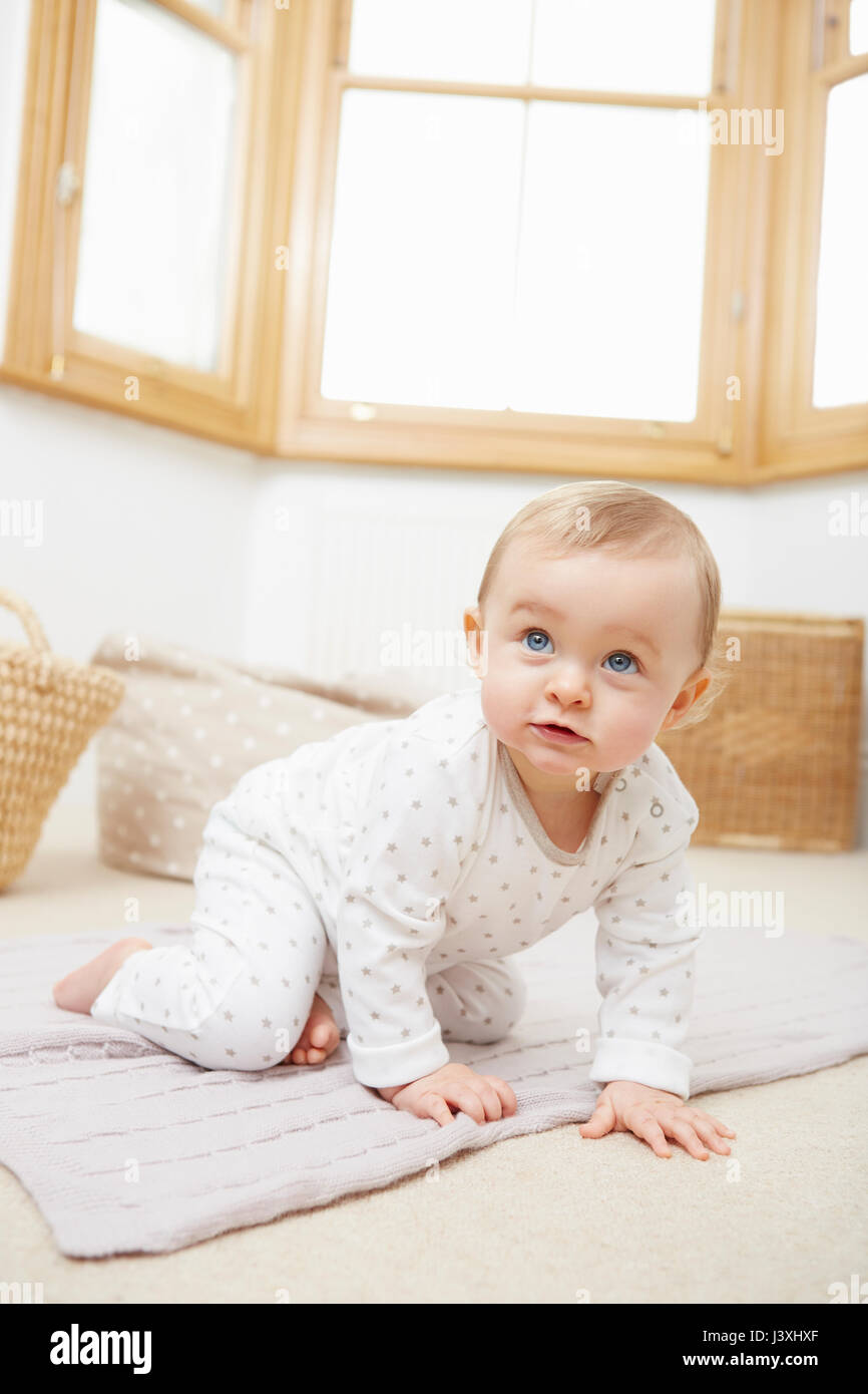 Female baby wearing blue babygro hi-res stock photography and images ...