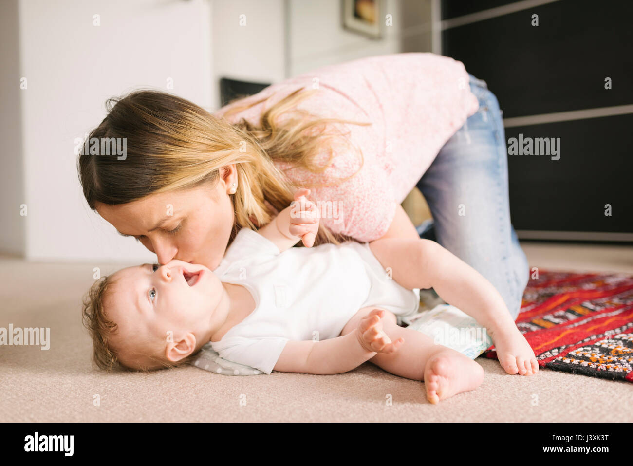 Boy bending over back hi-res stock photography and images - Alamy
