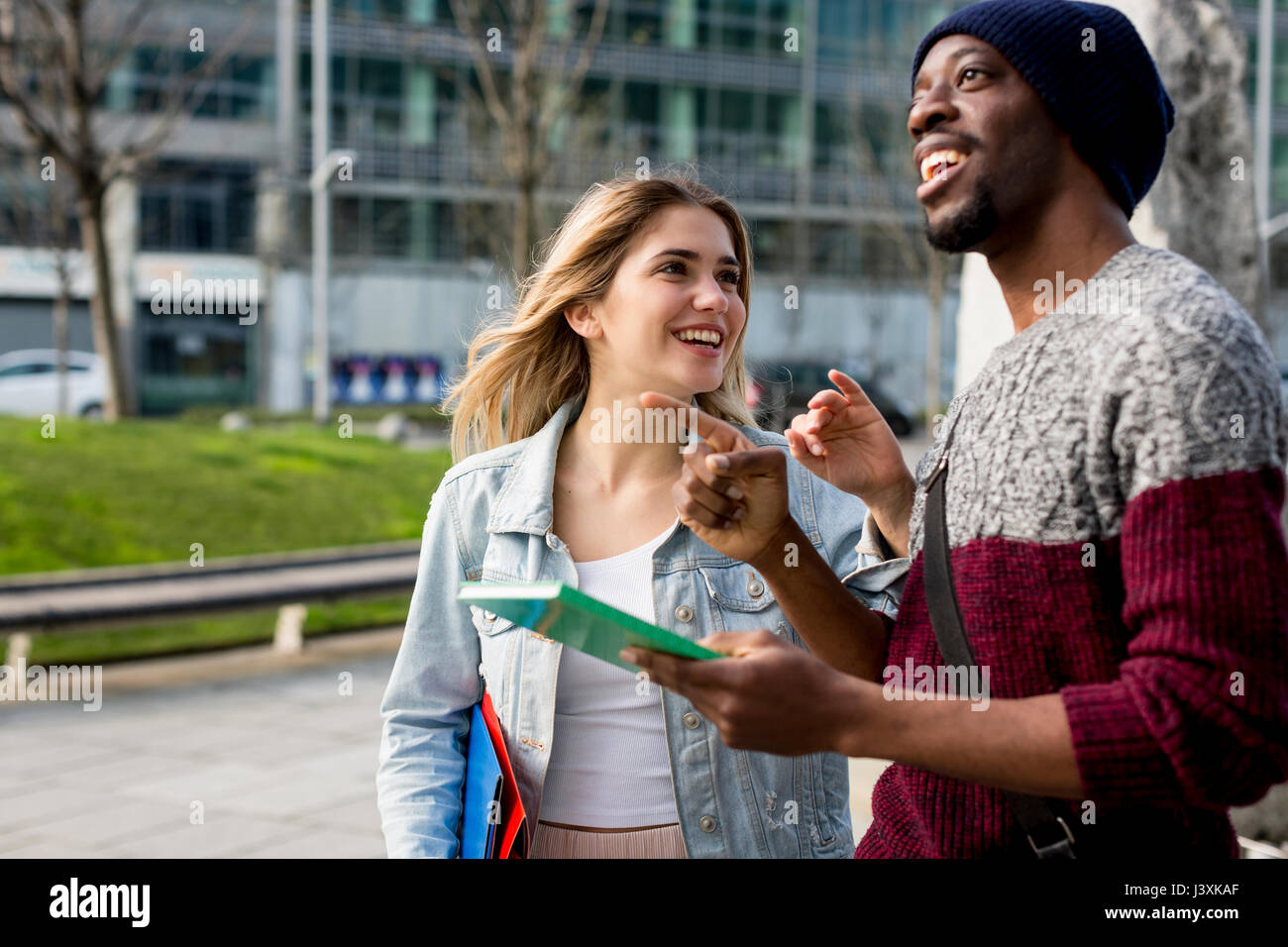 Two people meeting outdoor in the city. Milan, Italy Stock Photo - Alamy