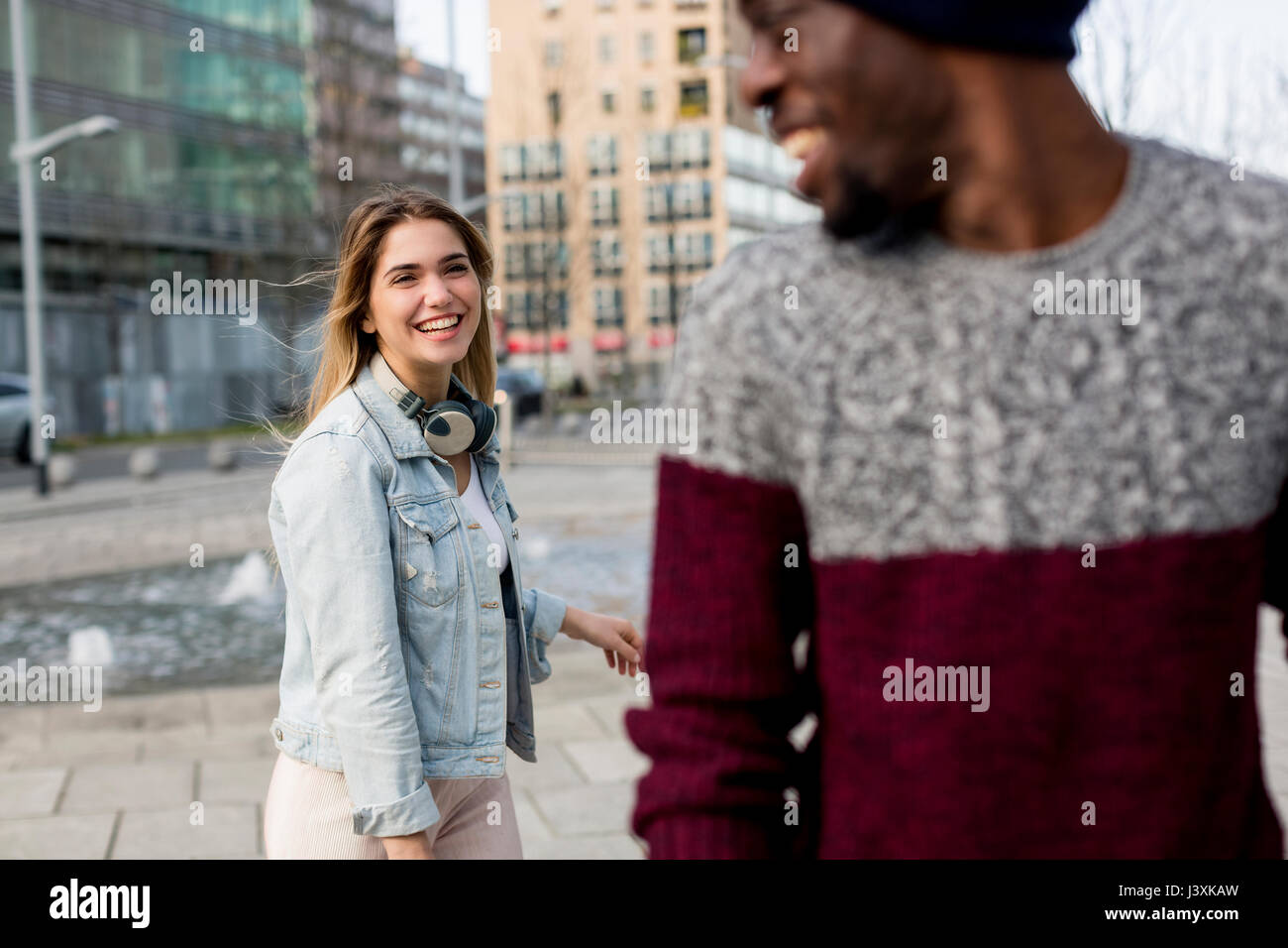 Two people meeting outdoor in the city. Milan, Italy Stock Photo - Alamy