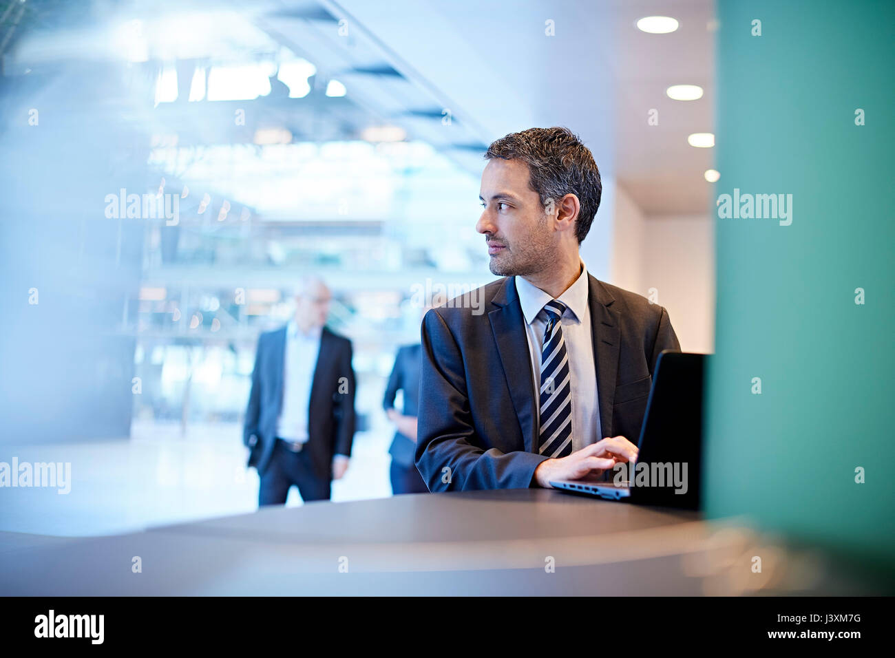 Watching computer over shoulder hi-res stock photography and images - Alamy