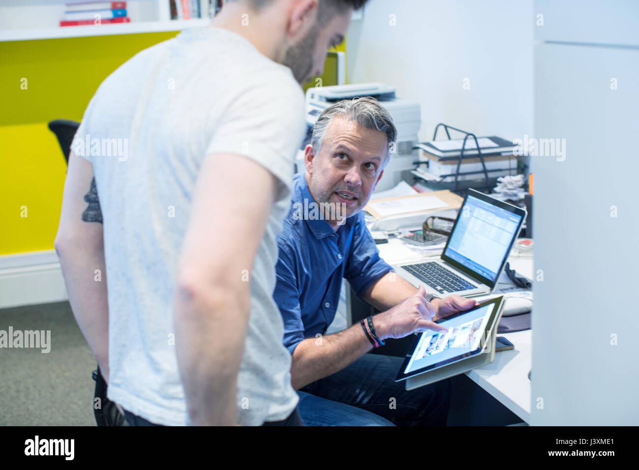 Teamwork technology colleagues collaborating hi-res stock photography ...