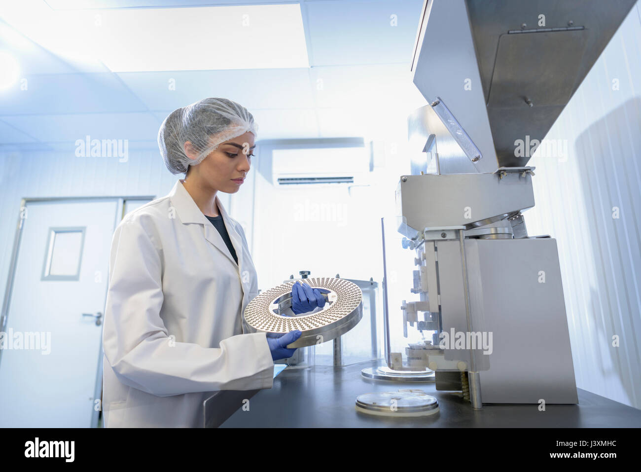 Woman using heavy machinery in hi-res stock photography and images - Alamy
