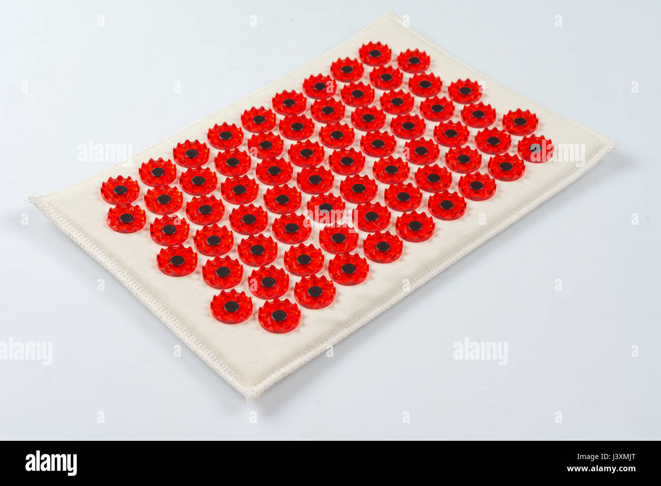 Orthopedic mat with sharp spikes Stock Photo - Alamy