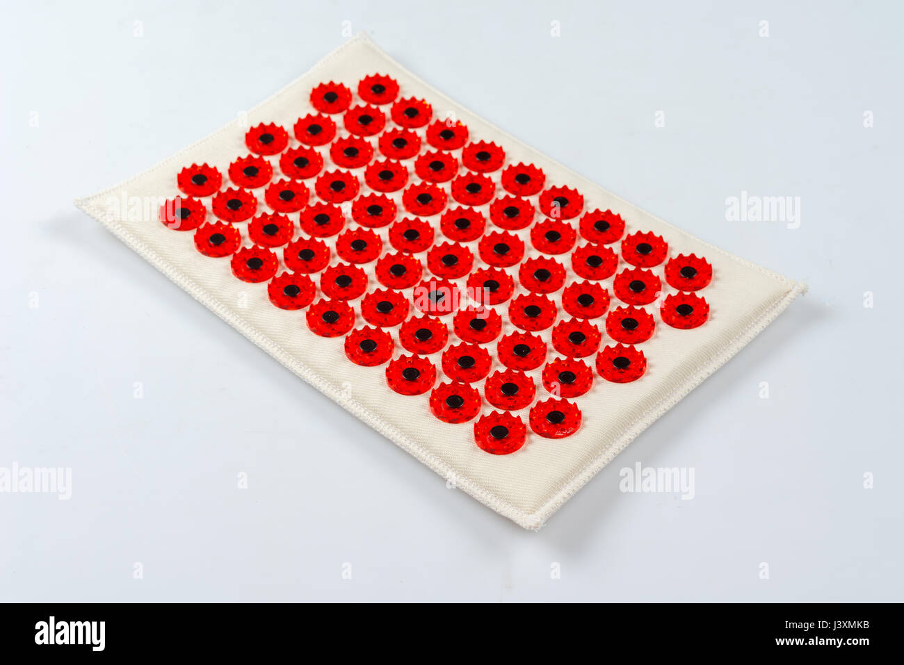 Orthopedic mat with sharp spikes Stock Photo - Alamy