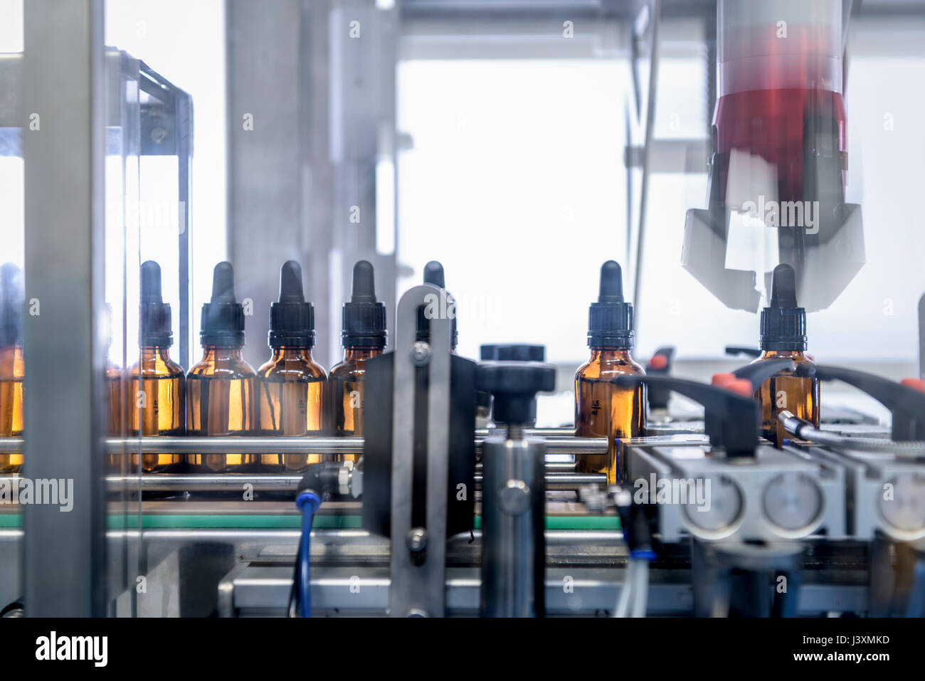Bottles in pharmaceutical factory Stock Photo - Alamy Bottles in pharmaceutical factory Stock Photo - Alamy