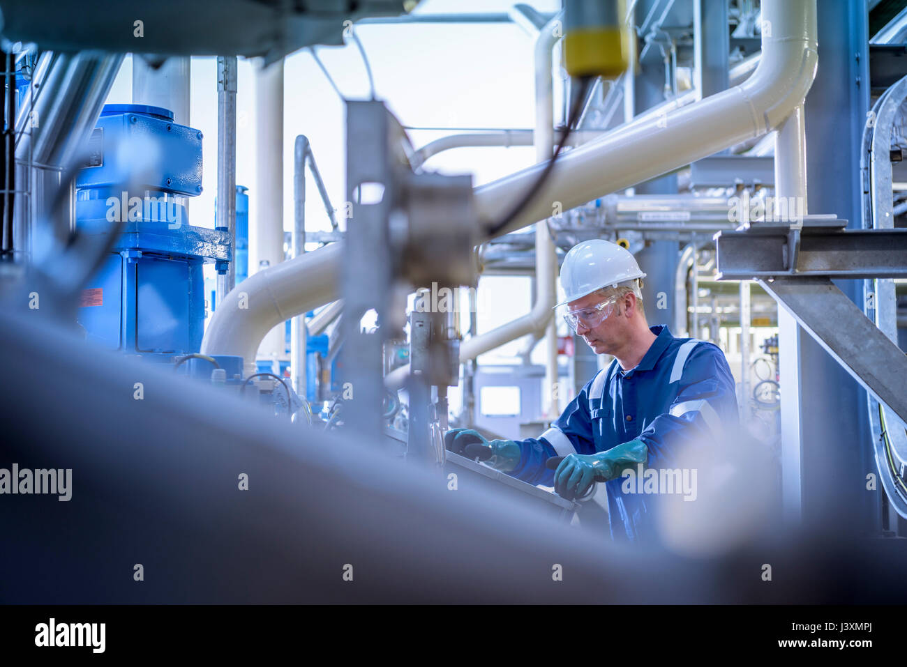 Process worker hi-res stock photography and images - Alamy