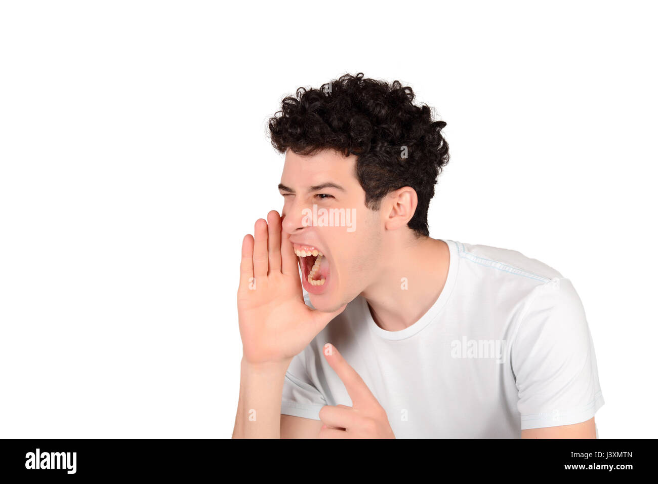 Portrait of a young man shouting. Isolated white background Stock Photo ...