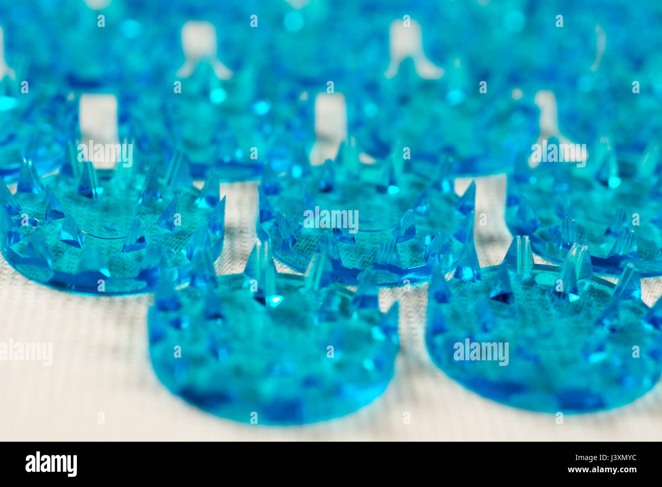 Orthopedic mat with sharp spikes Stock Photo - Alamy