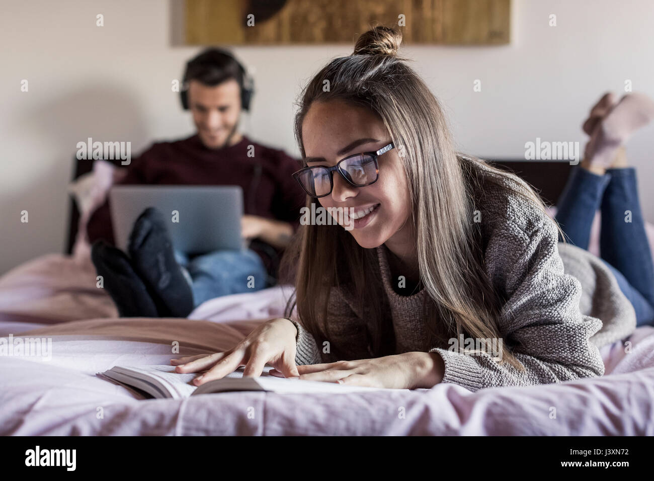 Using computer at home Stock Photo - Alamy