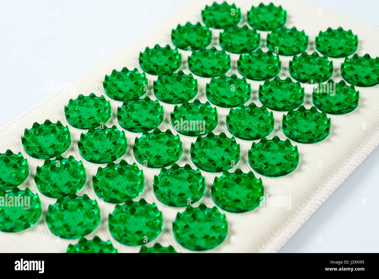 Orthopedic mat with sharp spikes Stock Photo - Alamy