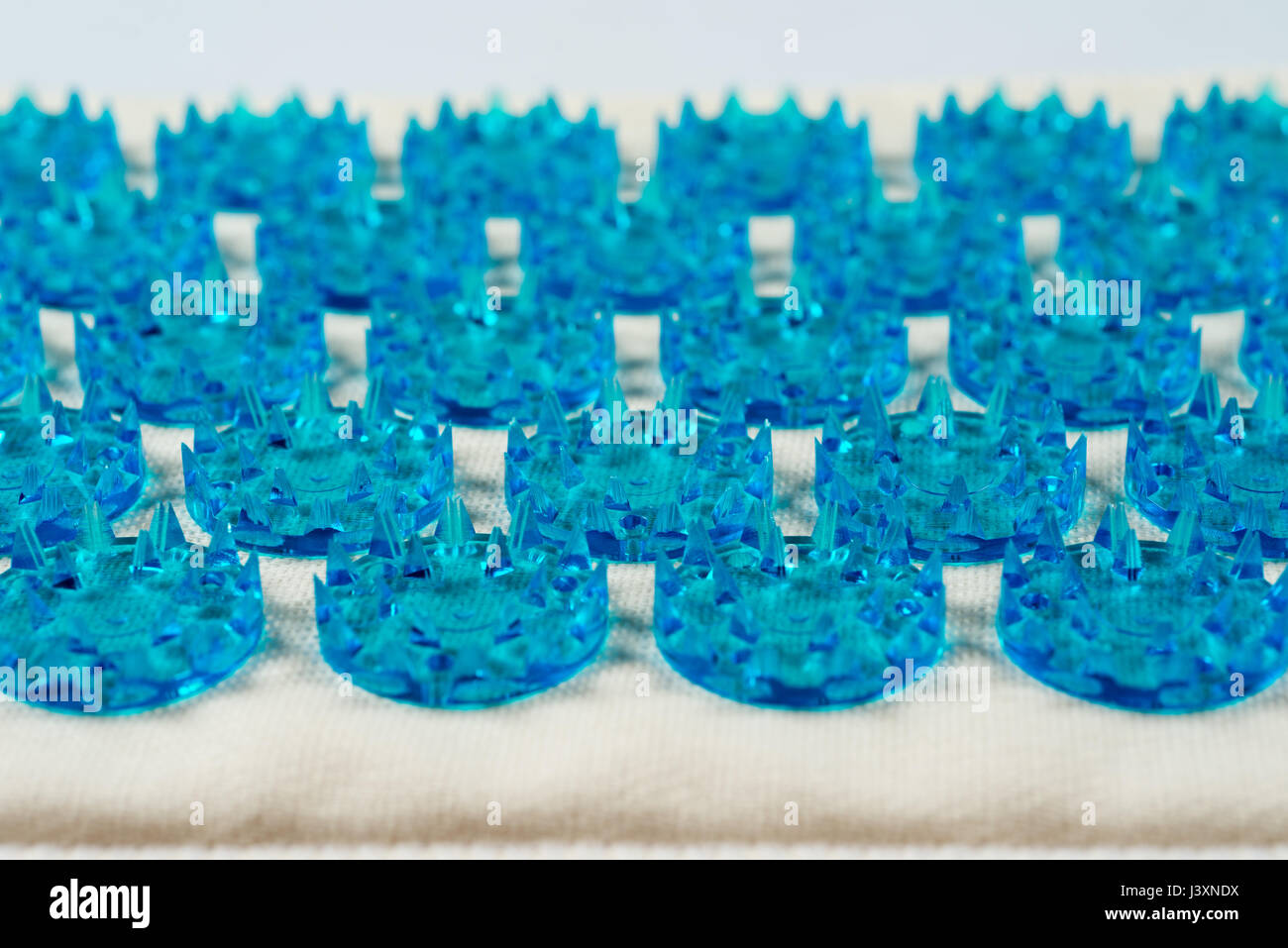 Orthopedic mat with sharp spikes Stock Photo - Alamy
