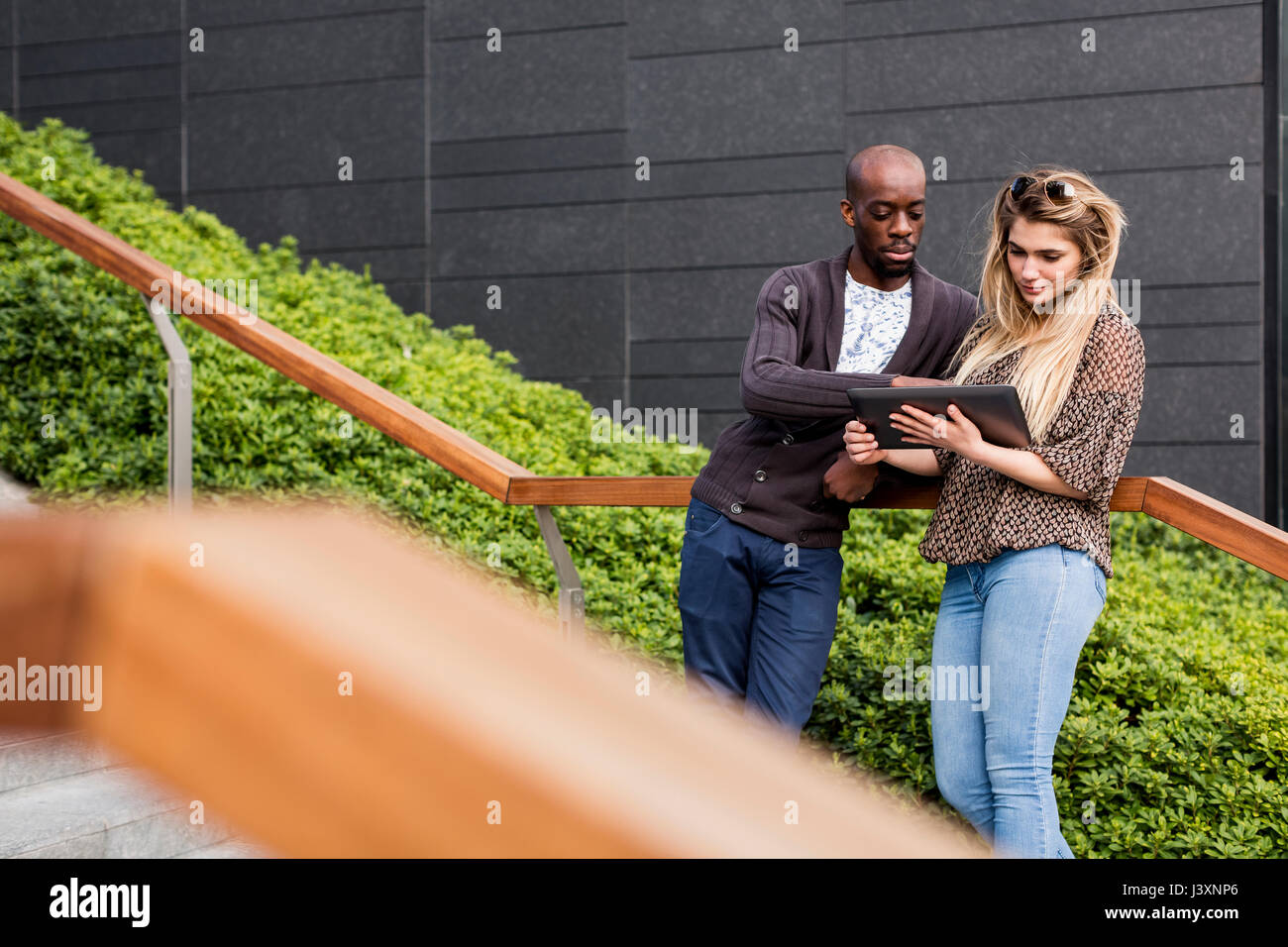 Two people meeting outdoor in the city. Milan, Italy Stock Photo - Alamy