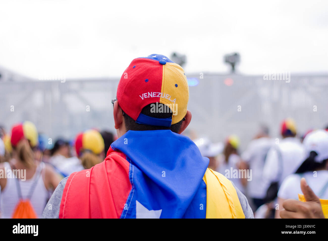 A young person with a cap of Venezuelan flag Stock Photo - Alamy