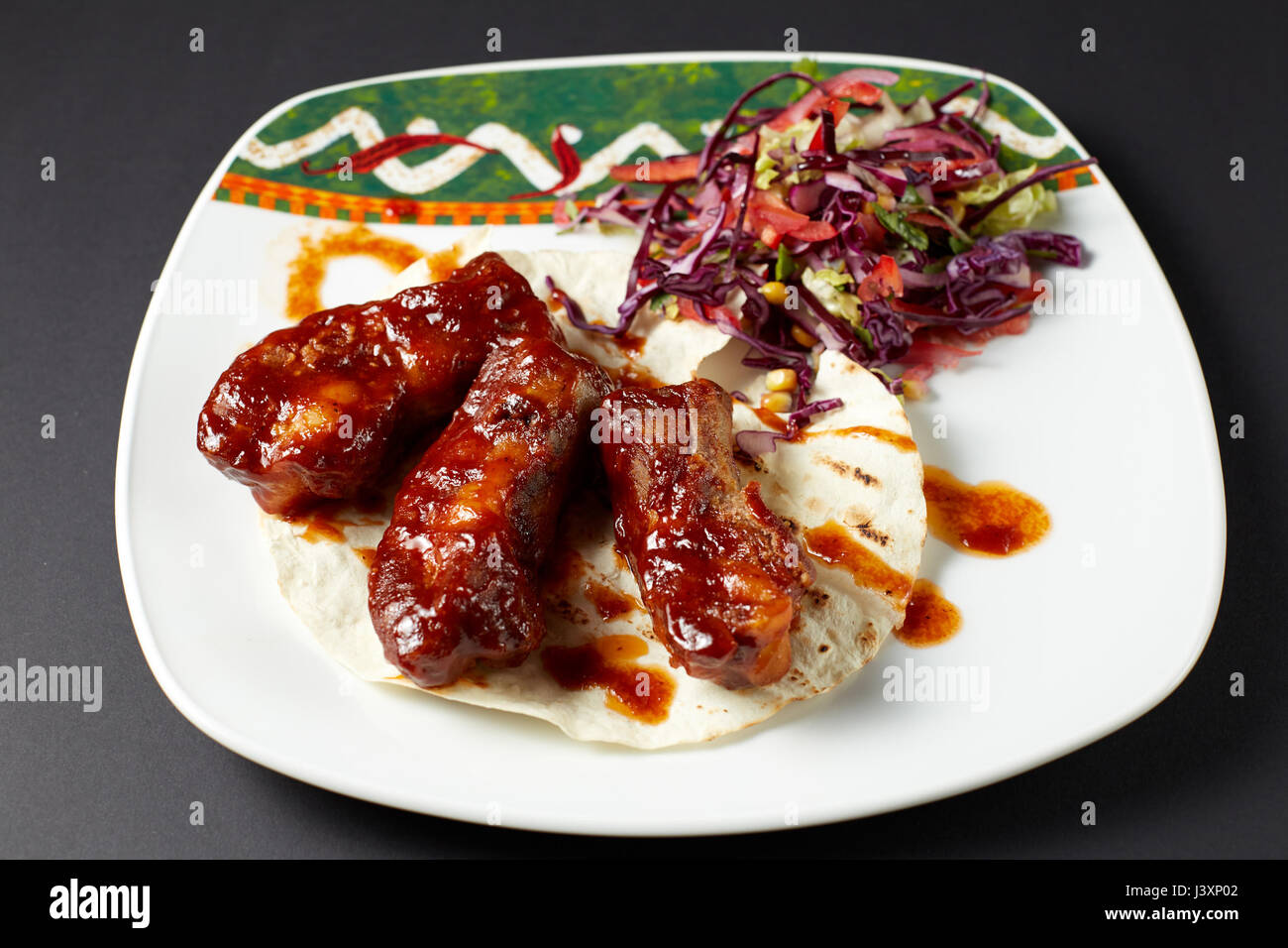 Pork ribs in Mexican style. Mexican food. Mexican cuisine. Studio shot ...