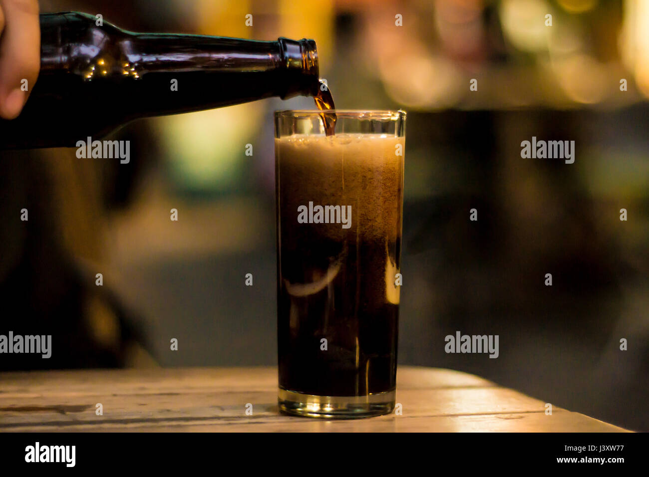 Hand with a drink hi-res stock photography and images - Alamy