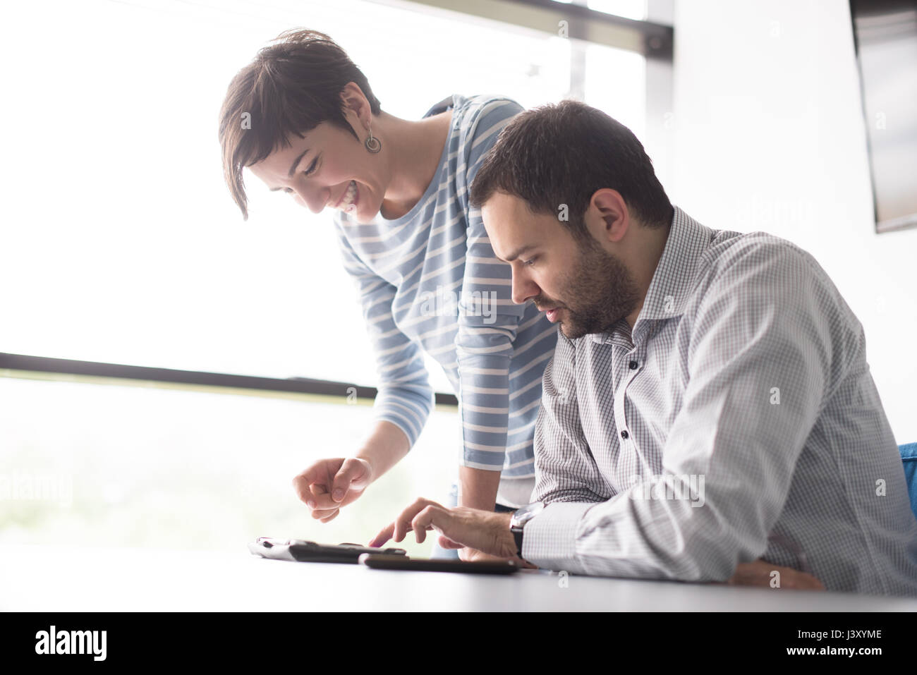 two business people preparing for next meeting and discussing ideas ...
