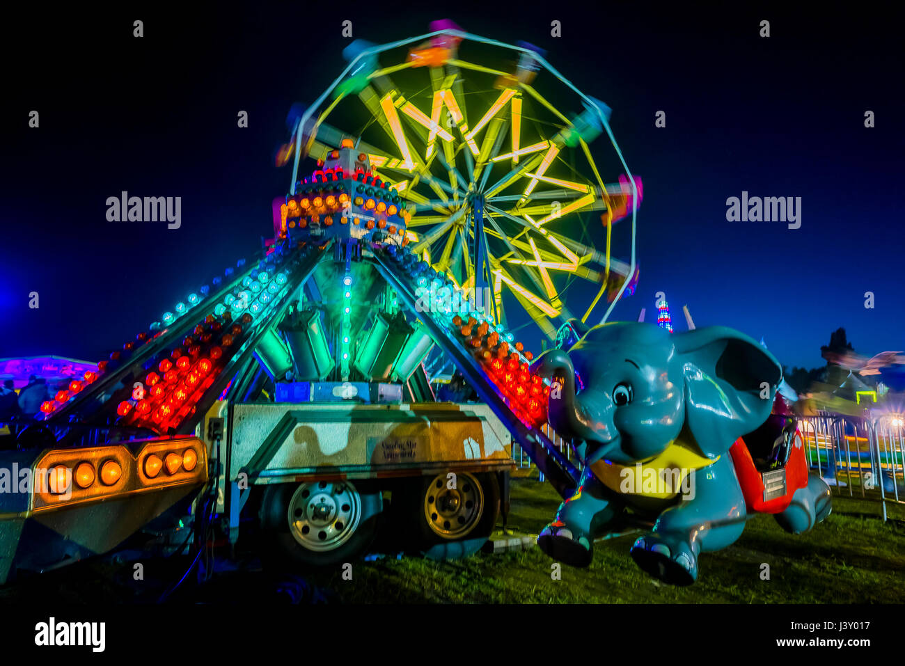 Dumbo the Elephant type Carnival Fun Fair Ride Stock Photo - Alamy