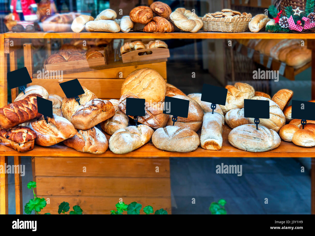 Modern bakery with assortment of different bread Stock Photo - Alamy
