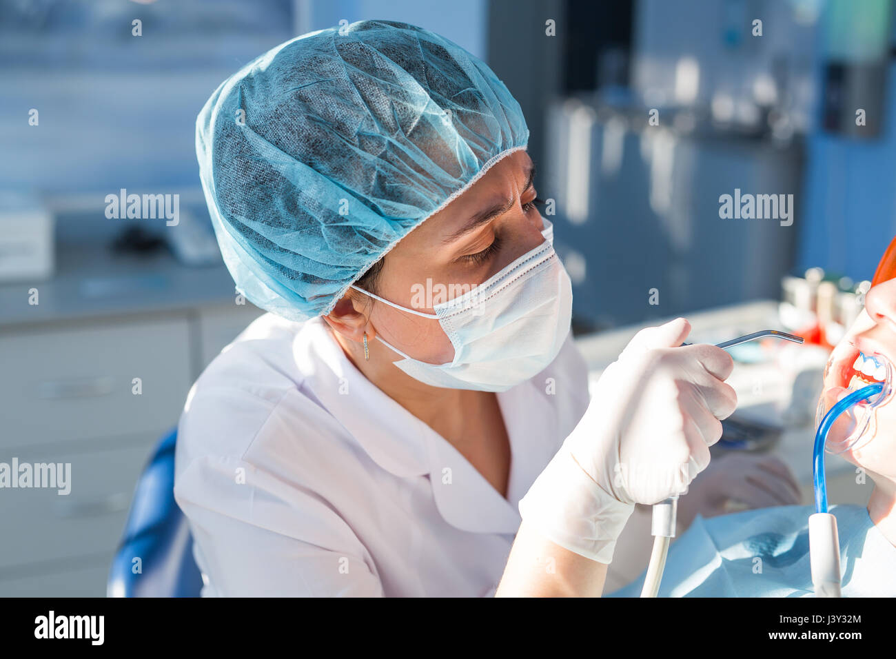 Teeth whitening procedure in the dental office Stock Photo - Alamy