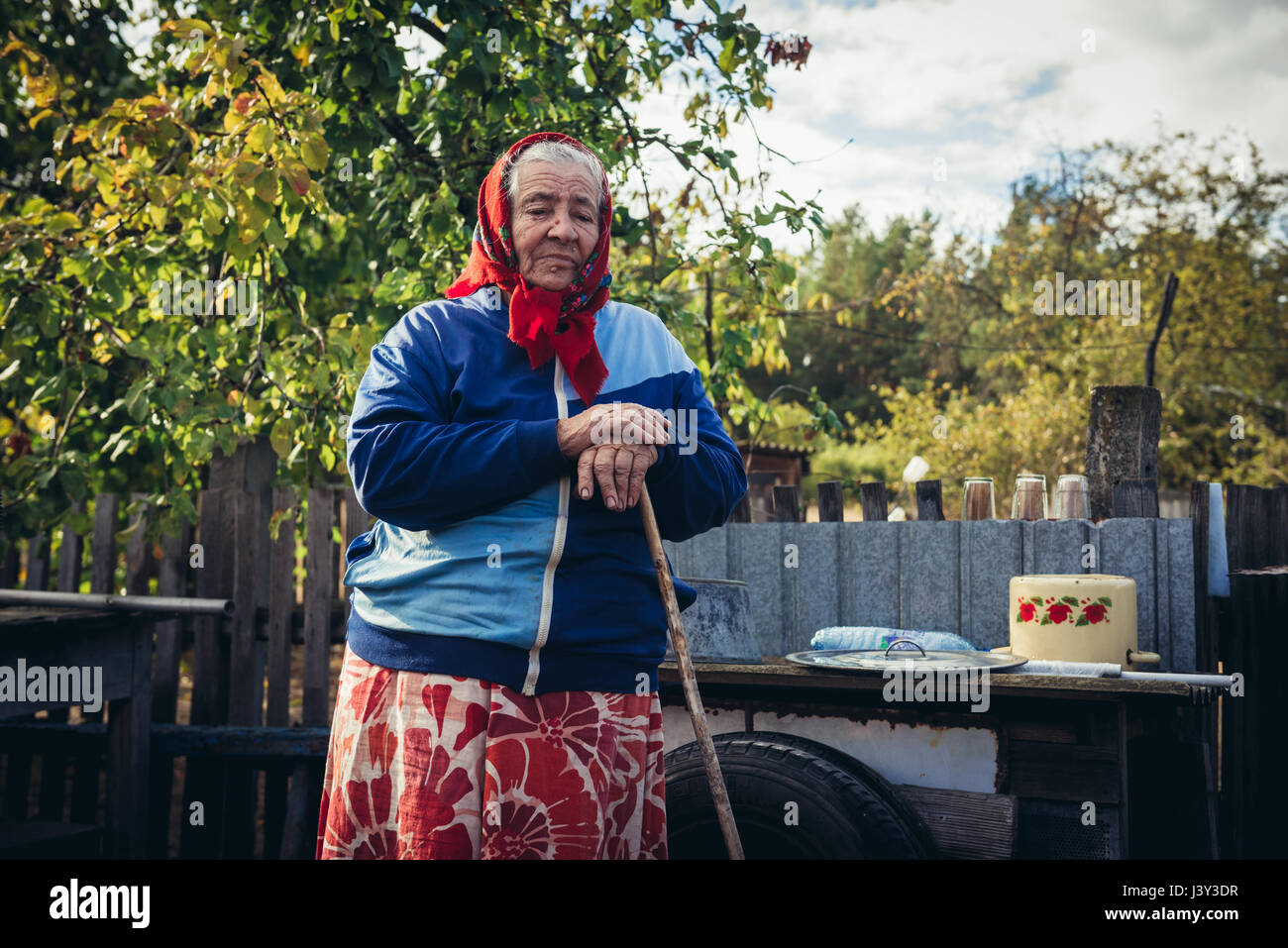 Woman who has returned to her farm (so called Samosely) in Kupuvate ...