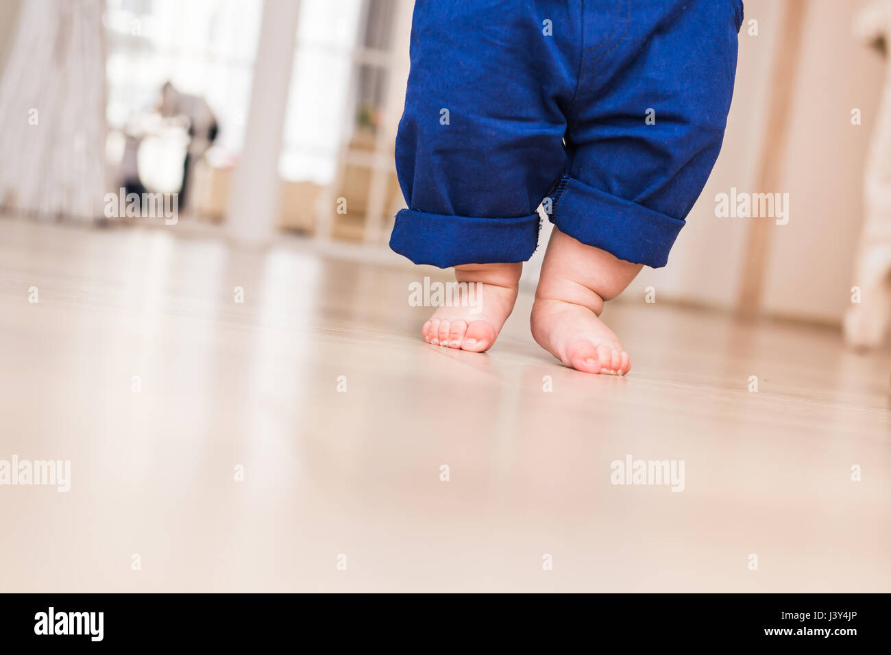 Baby legs. First steps Stock Photo - Alamy